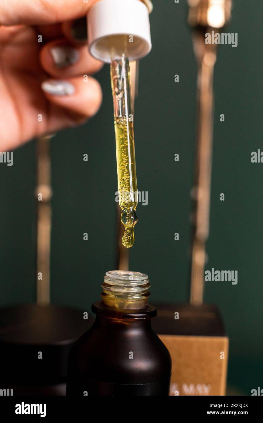 Cosmetic pipette oily drop hi-res stock photography and images - Alamy