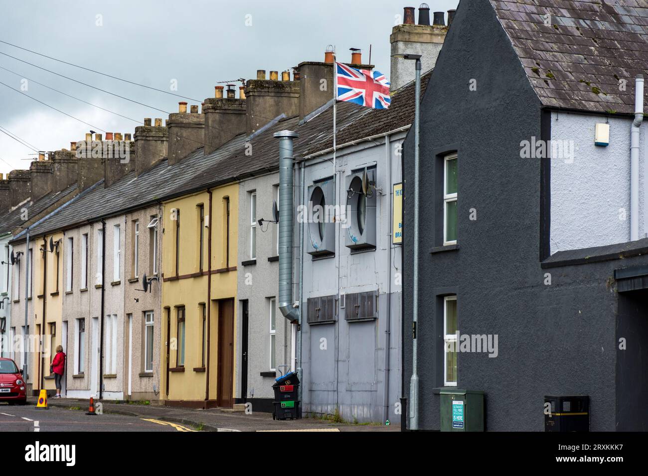 Terraced housing and Union Jack flag in Ballyclare, County Antrim ...