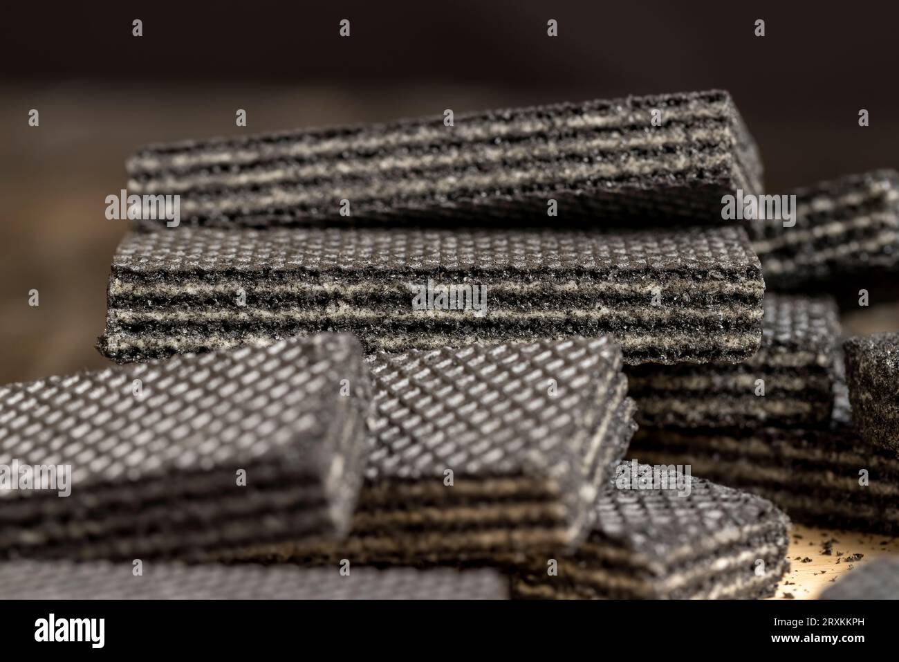 Crispy black waffles with cream filling, close-up of sweet black ...