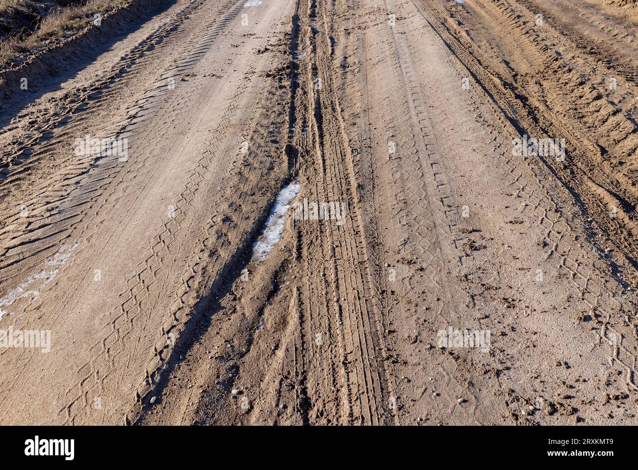 Rural road in winter, dangerous road for cars in the winter cold season ...