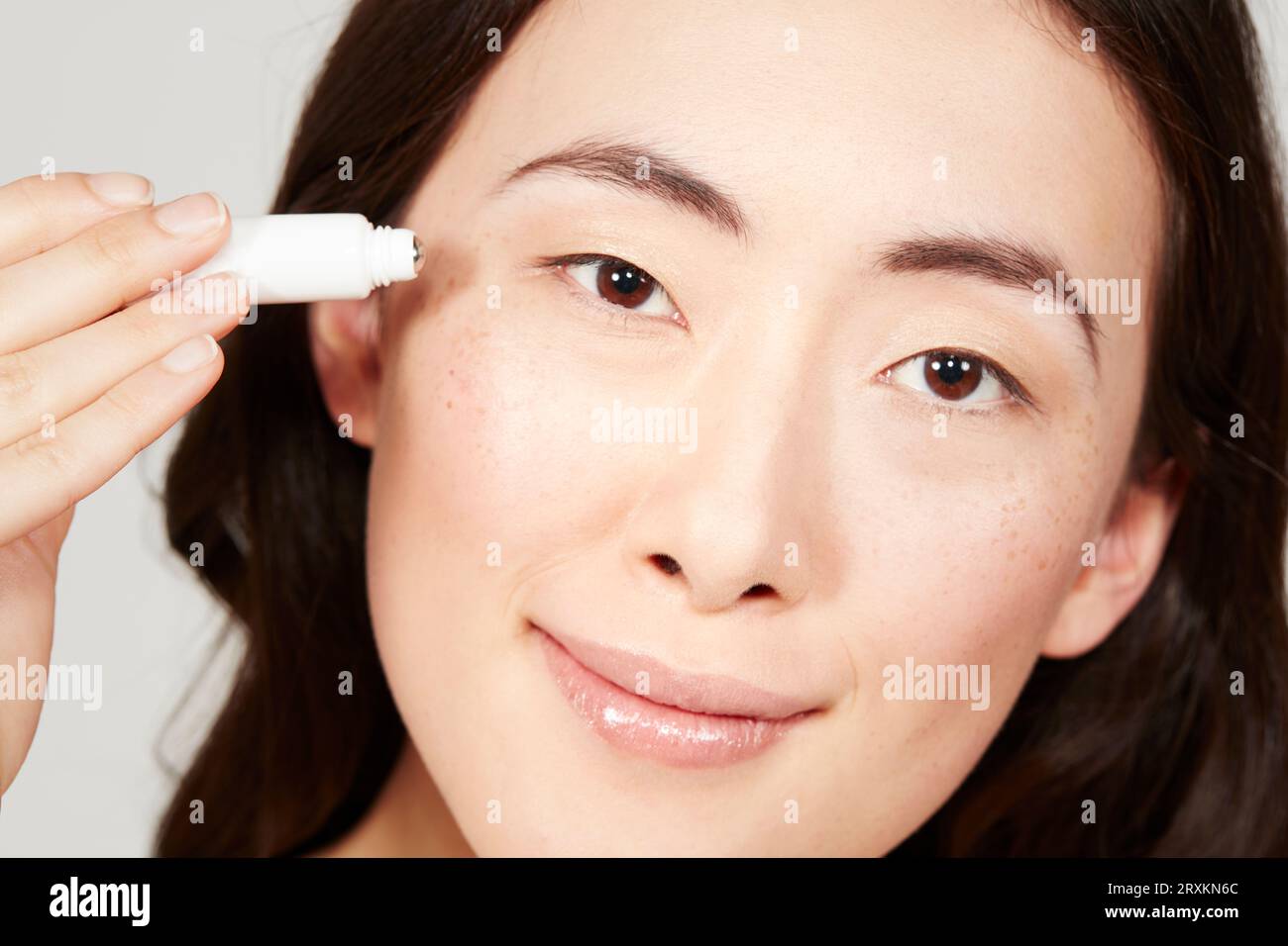 Close up shot applying cream hi-res stock photography and images - Alamy