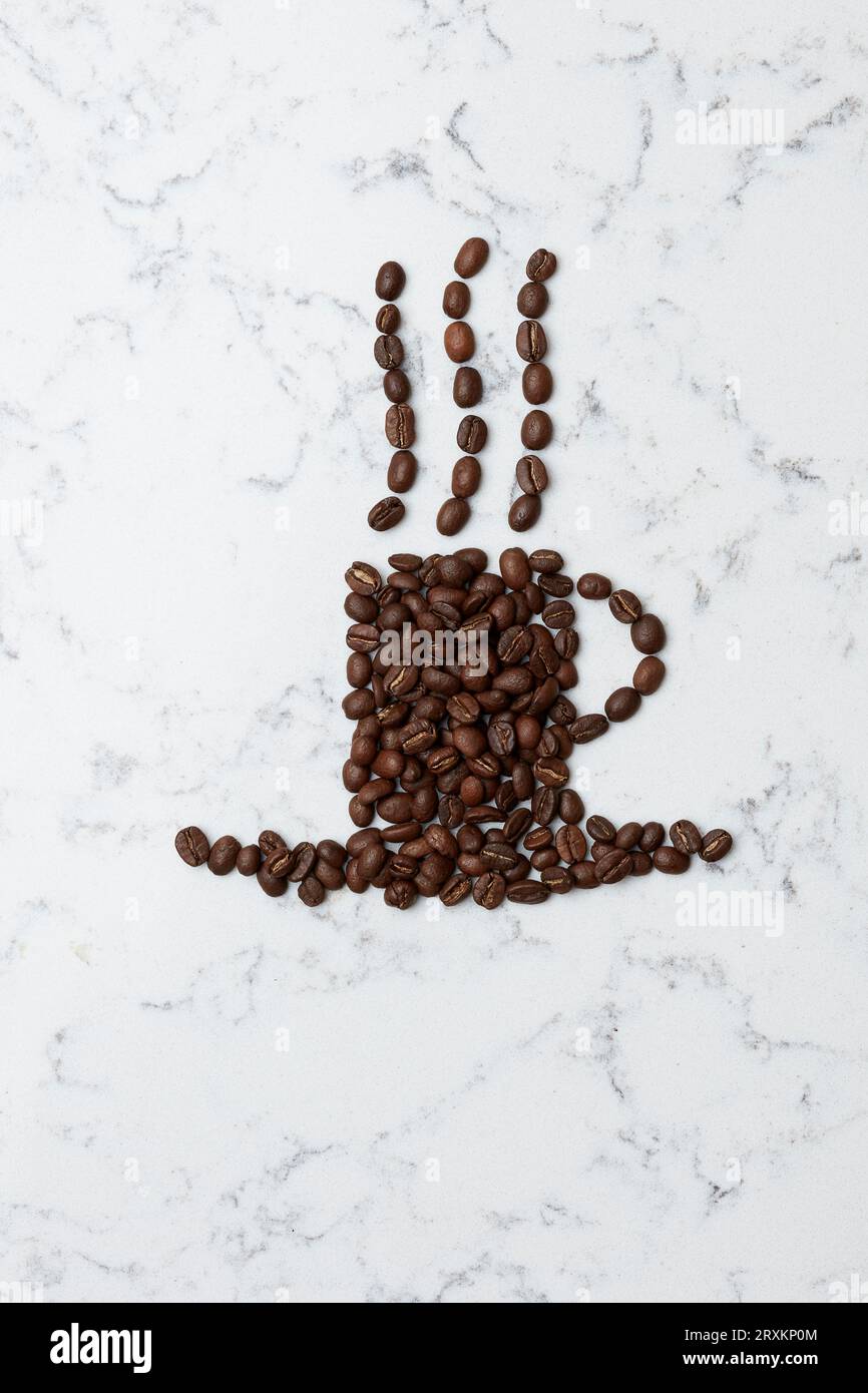 Coffee beans in shape of coffee cup Stock Photo - Alamy