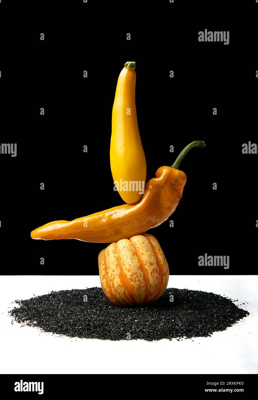 Stacked pumpkin, chili pepper, and squash Stock Photo - Alamy