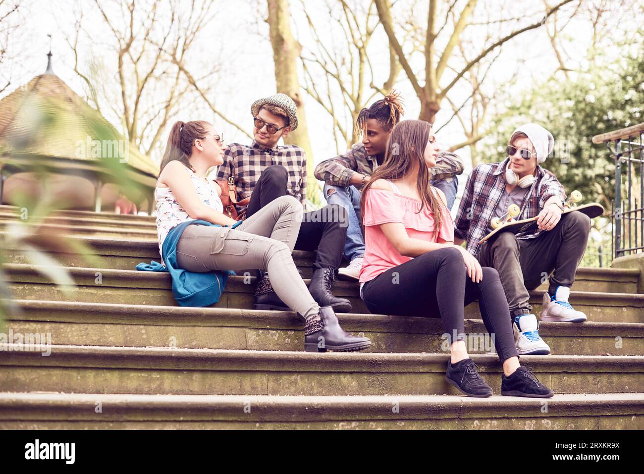 Boys girls sitting steps hi-res stock photography and images - Alamy
