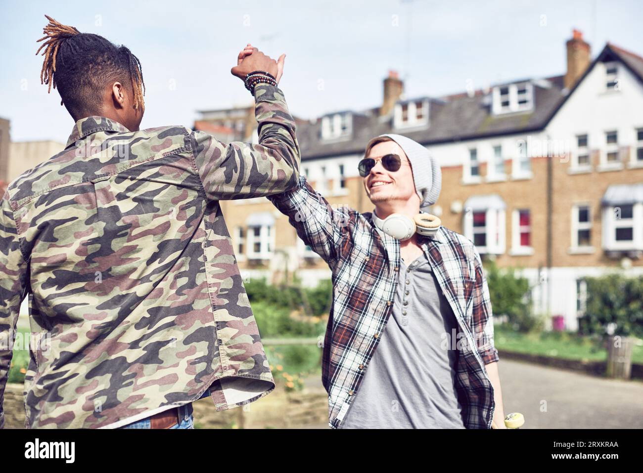 Teen high five hi-res stock photography and images - Alamy