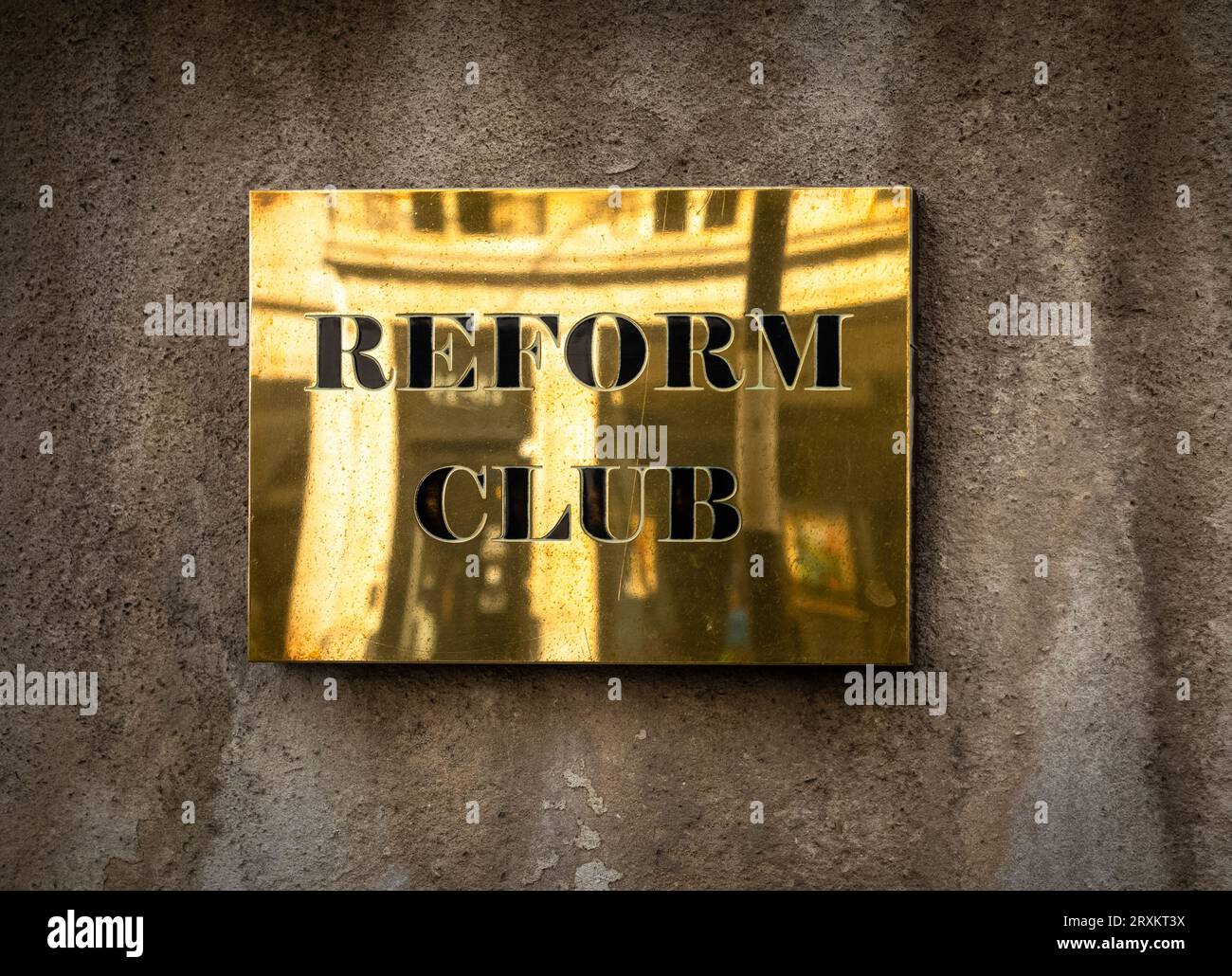 The brass wall plaque for the Reform Club in Pall Mall, London, UK. The ...