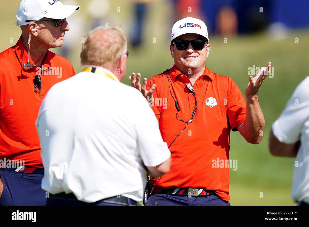 USA Captain Zach Johnson in conversation with officials as he watches ...