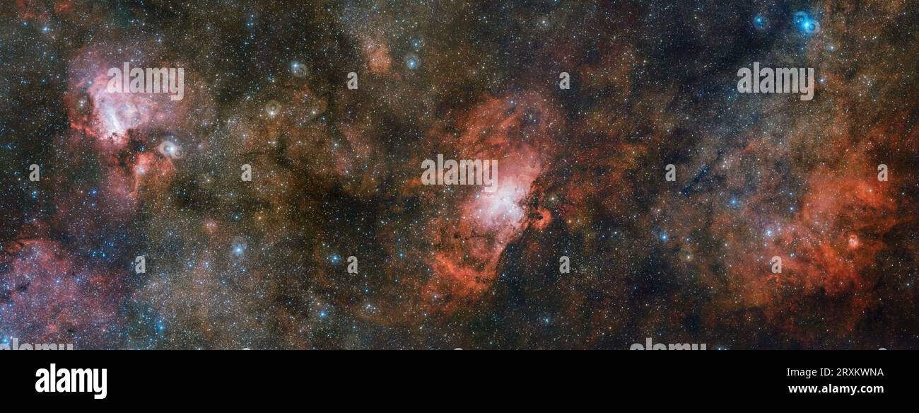 Vast starfield with red nebulas and blue stars Stock Photo - Alamy