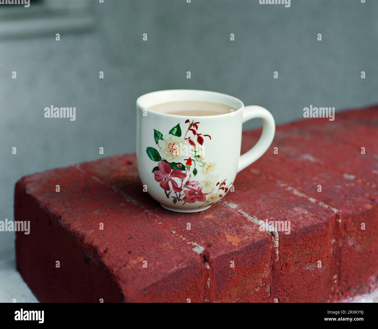 Tea cup with floral pattern Stock Photo - Alamy