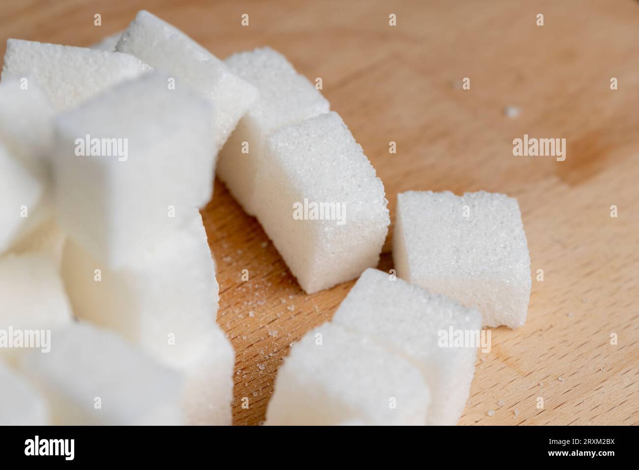 White sugar made from beetroot, cubes of white beet sugar close-up ...