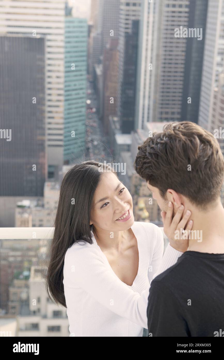 Woman on balcony new york city hi-res stock photography and images - Alamy