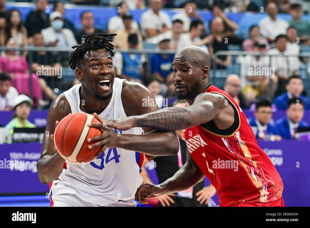 Hangzhou, China. 26th Sep, 2023. Angelo Kouame (L) of the Philippine ...