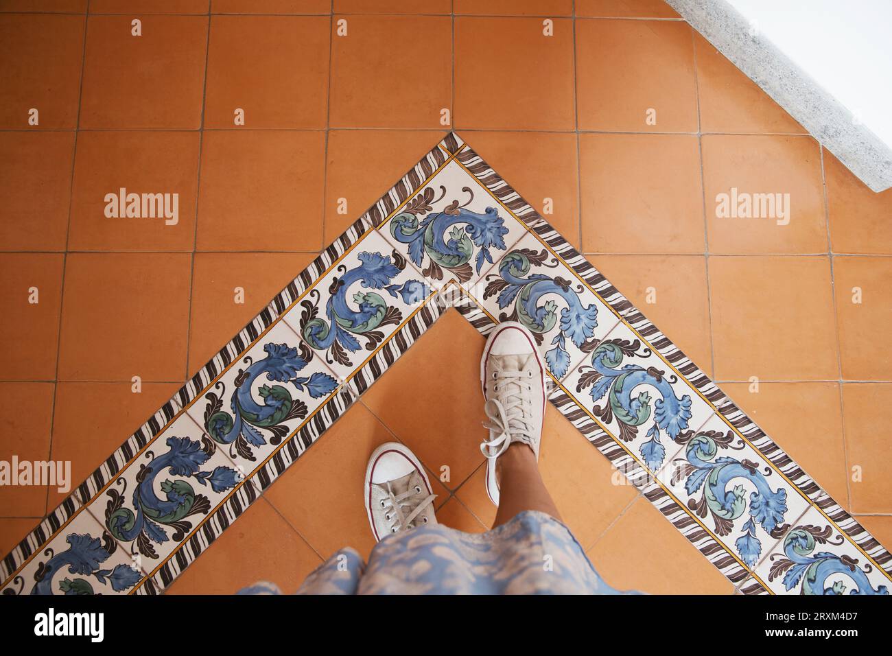 Standing on tiled floor hi-res stock photography and images - Alamy