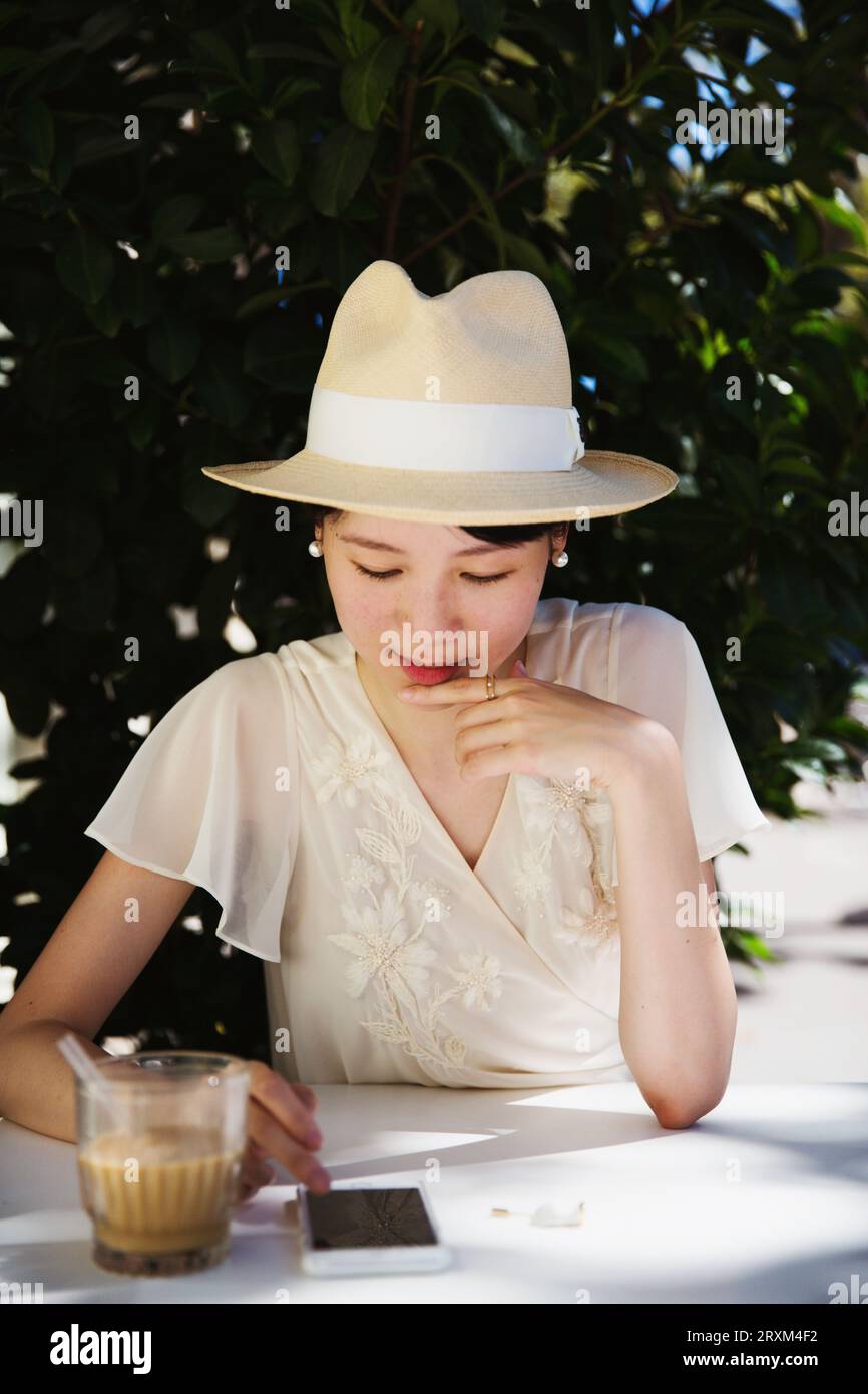 Woman tied to table hi-res stock photography and images - Alamy