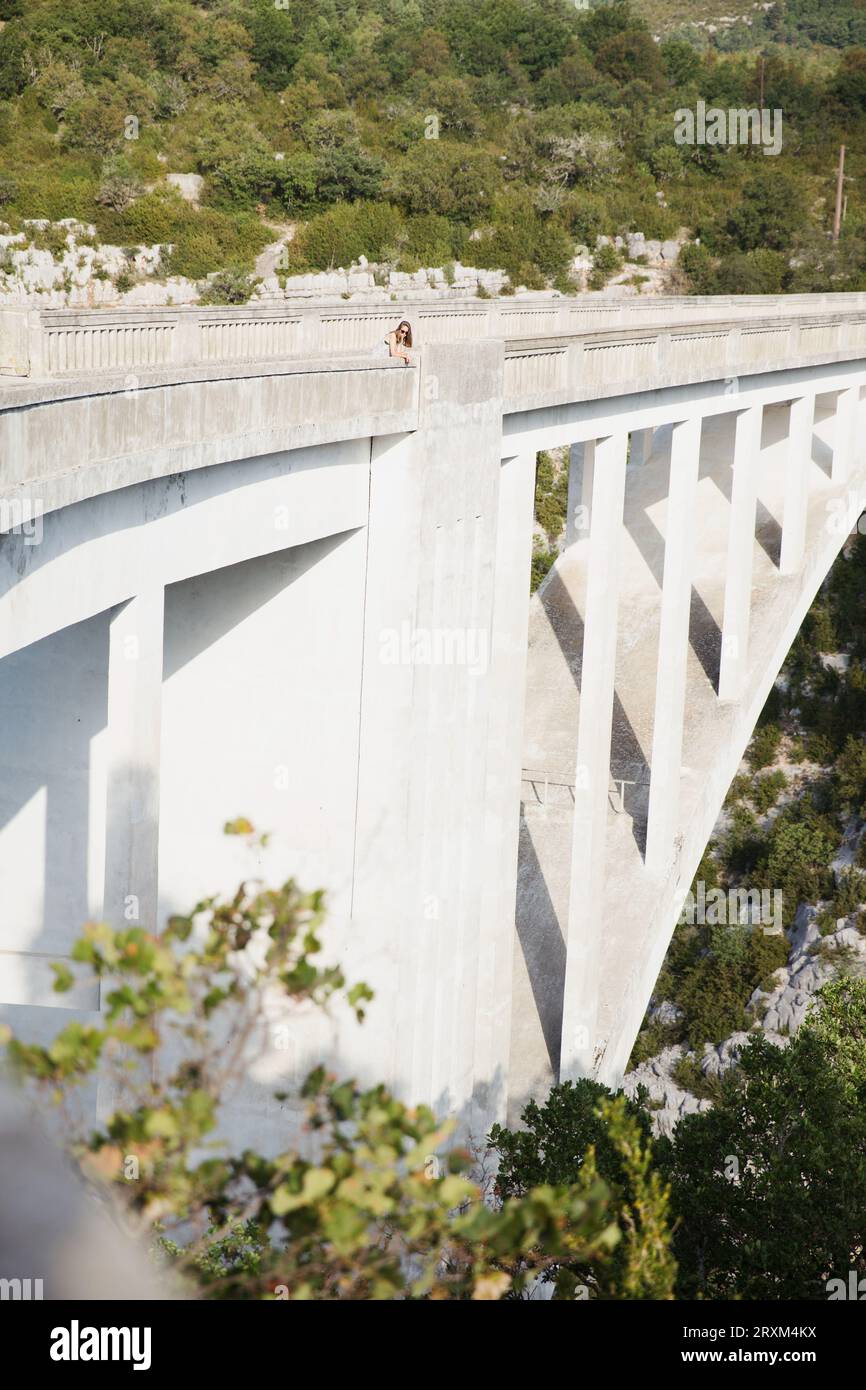 Woman lean bridge hi-res stock photography and images - Alamy