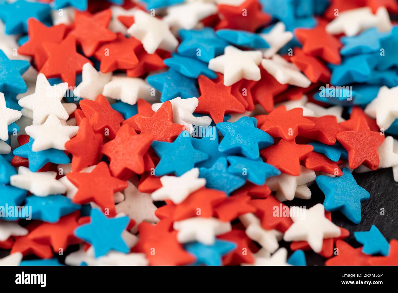 red, white and blue star-shaped candies for decorating cakes and other ...