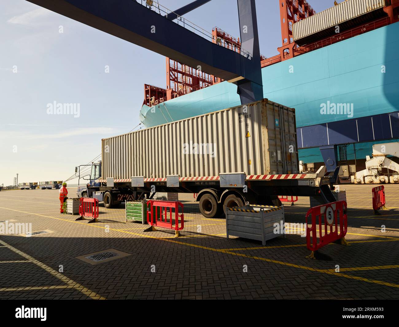 Truck with cargo container at Port of Felixstowe, England Stock Photo ...