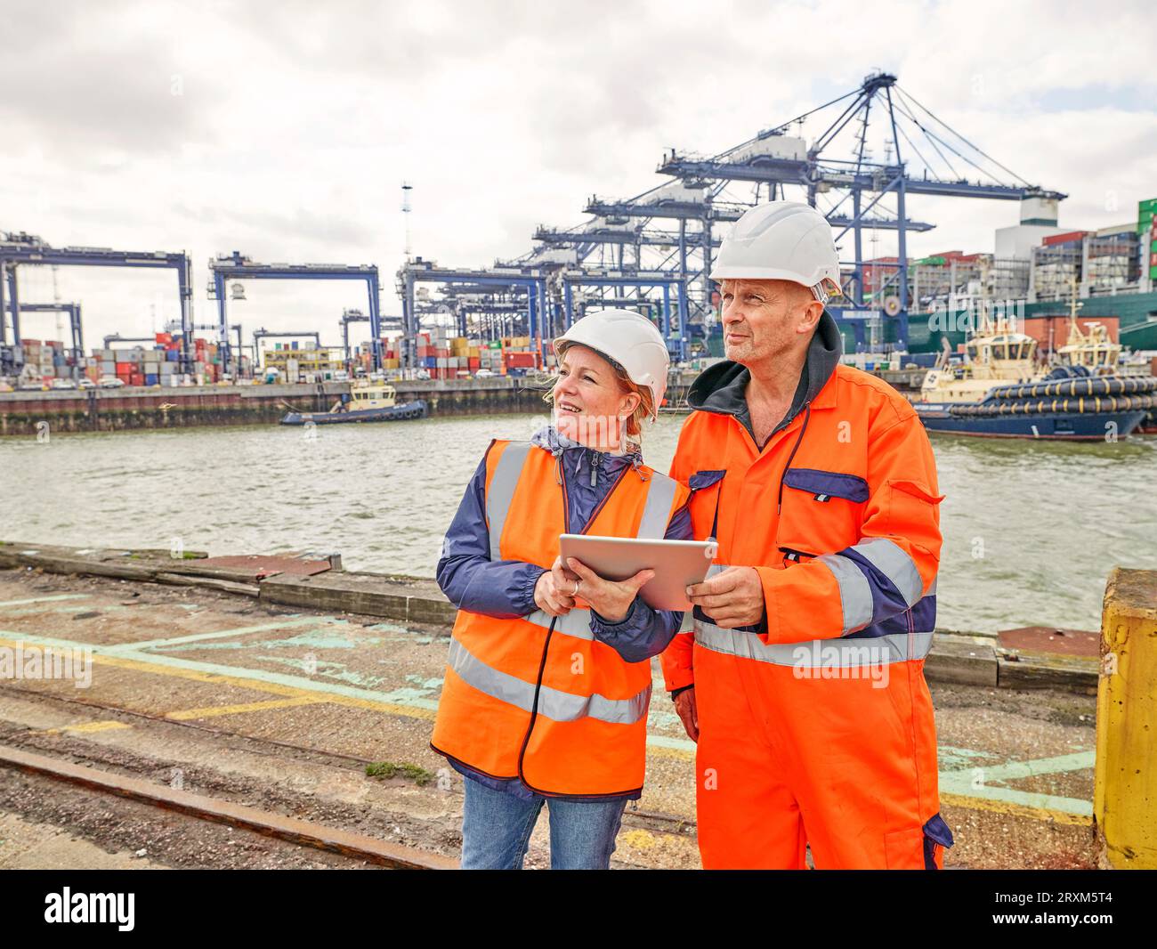 Dock workers with digital tablet at Port of Felixstowe, England Stock ...