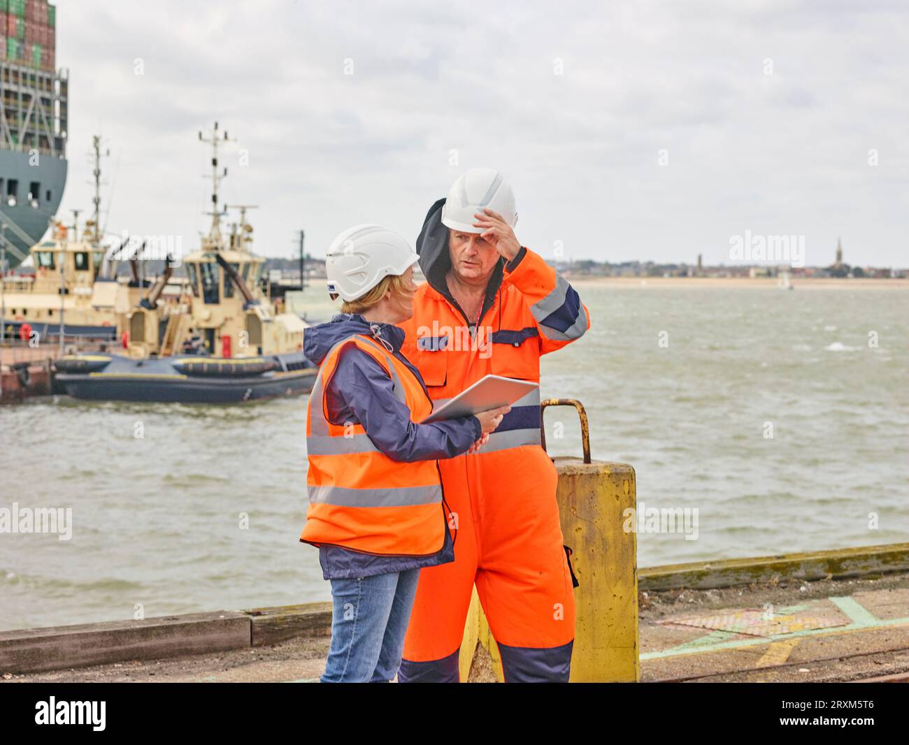 Dock workers with digital tablet at Port of Felixstowe, England Stock ...