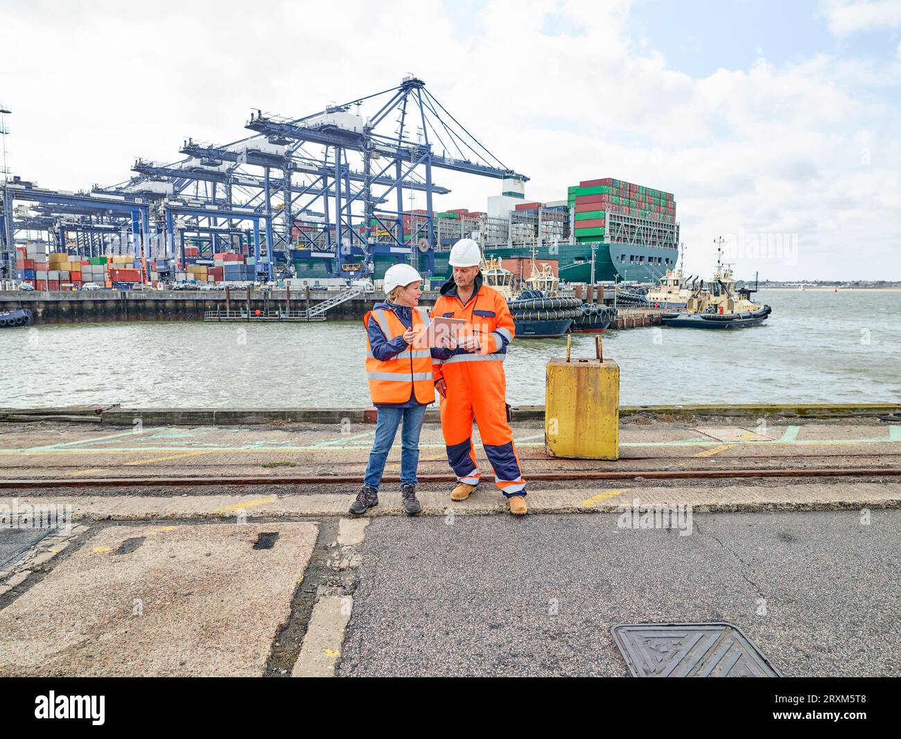 Dock workers with digital tablet at Port of Felixstowe, England Stock ...