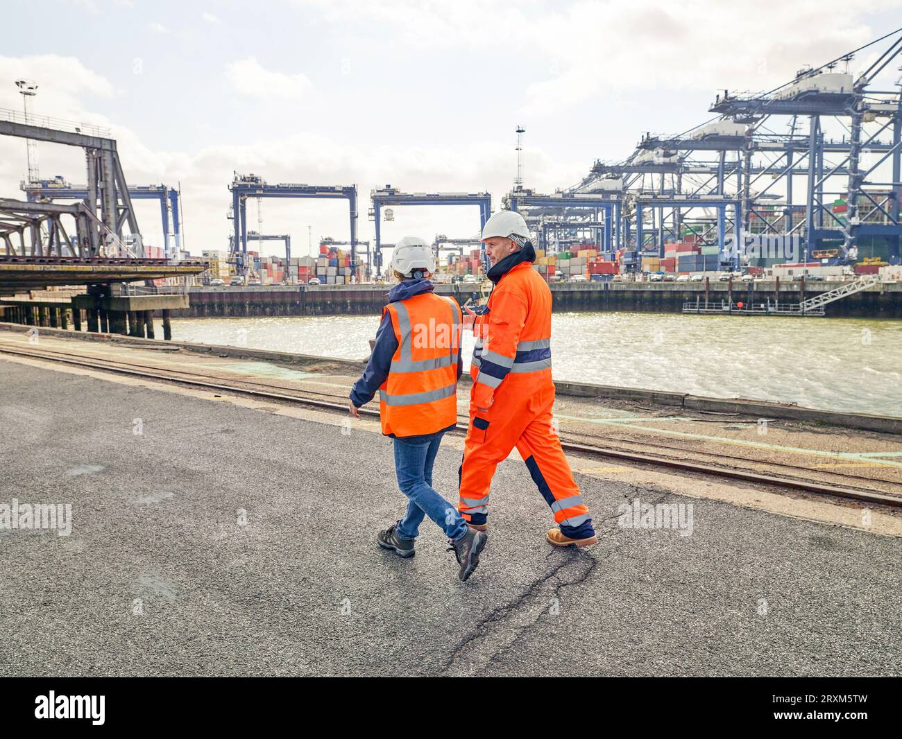 Dock workers walking at Port of Felixstowe, England Stock Photo - Alamy