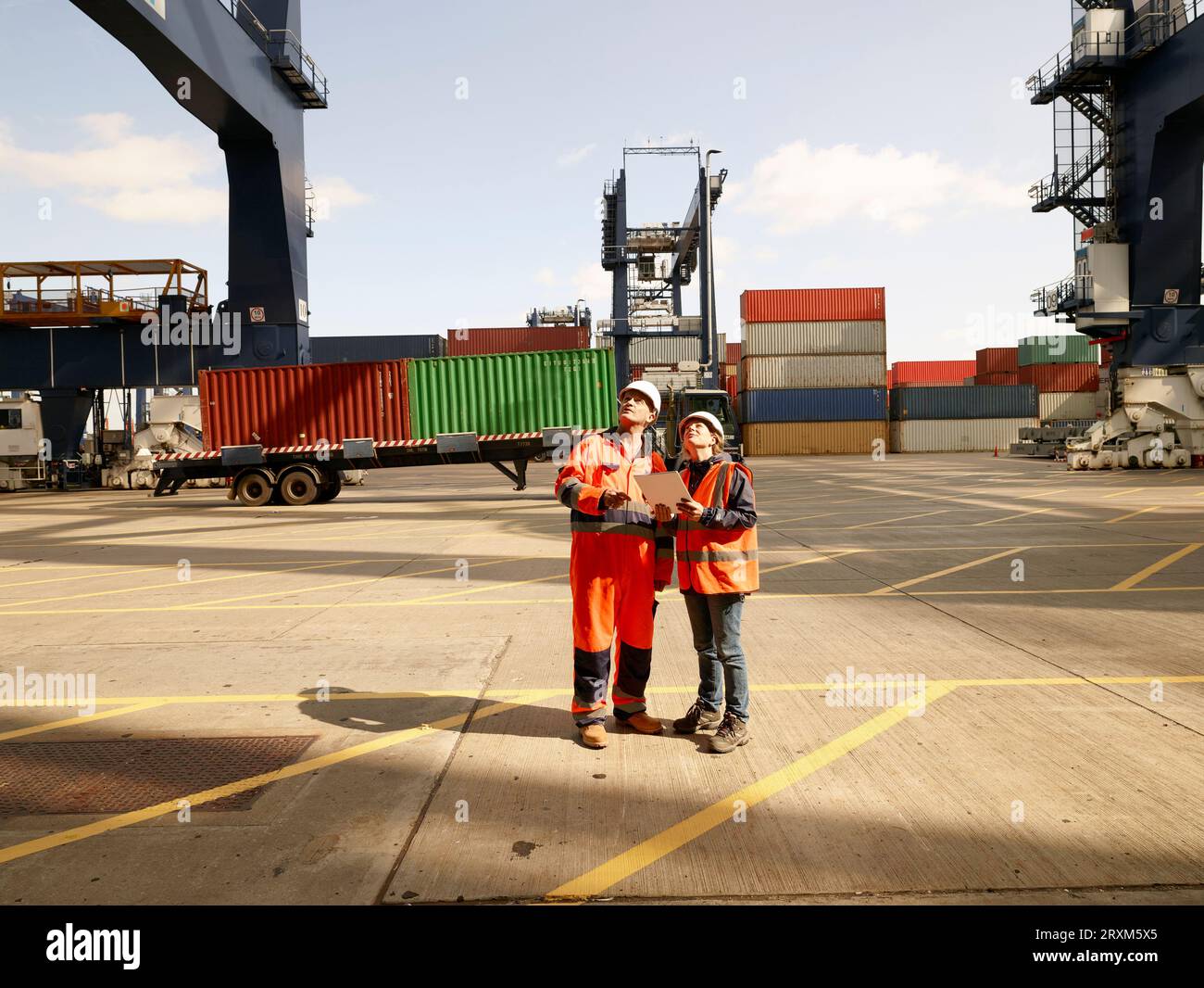 Dock workers using tablet PC at Port of Felixstowe, England Stock Photo ...