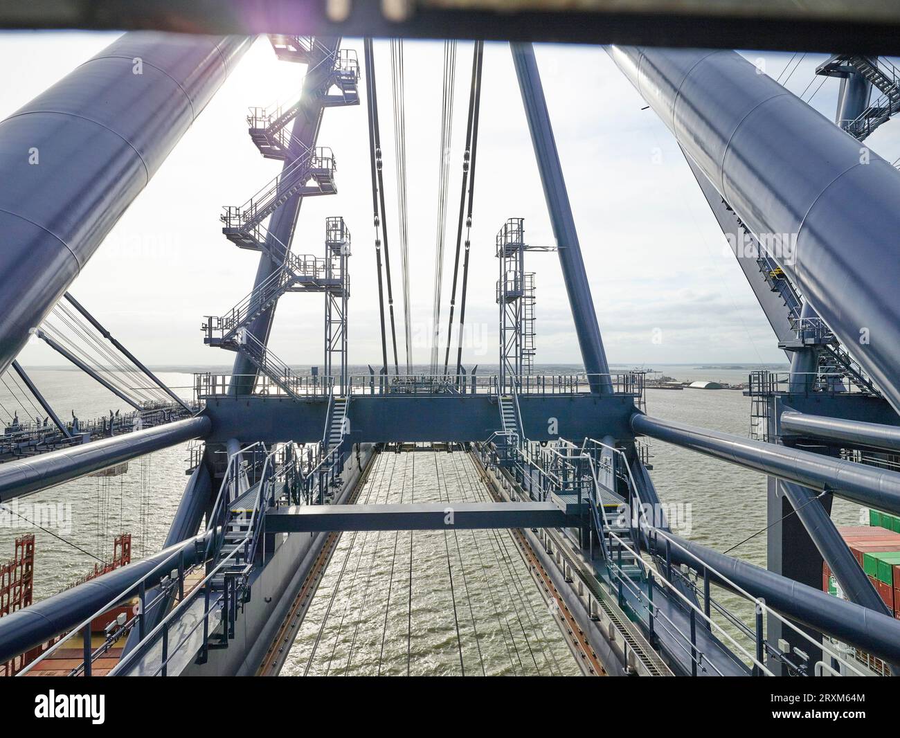 Dock crane above sea Stock Photo - Alamy