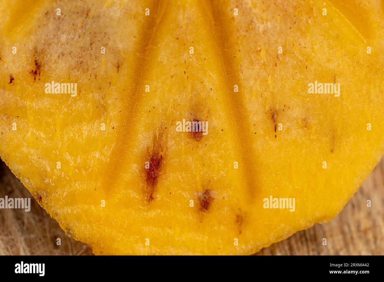 Half-ripe orange persimmon, fresh ripe persimmon cut into pieces on a ...