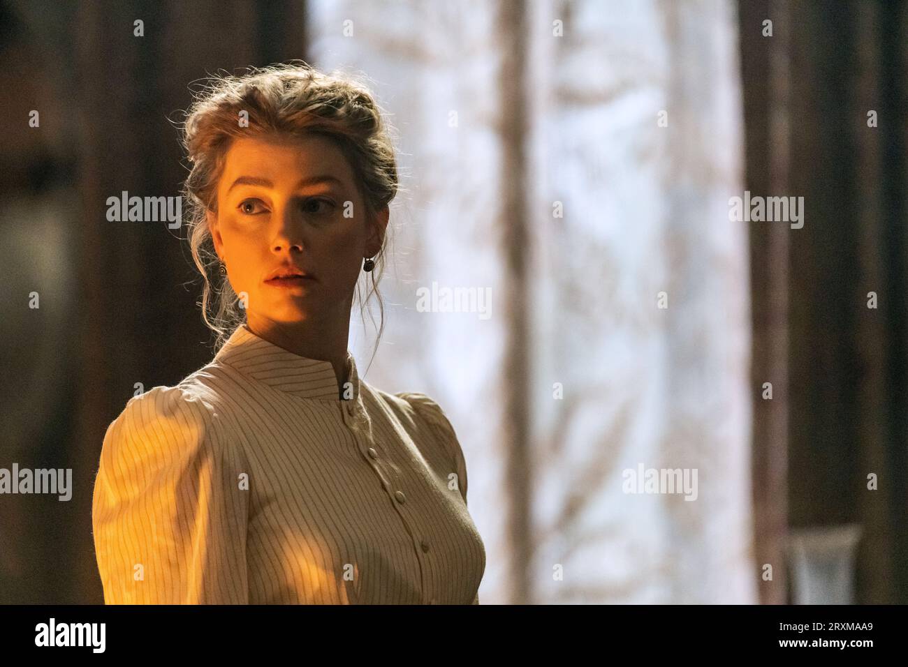 In the Fire Amber Heard Stock Photo - Alamy