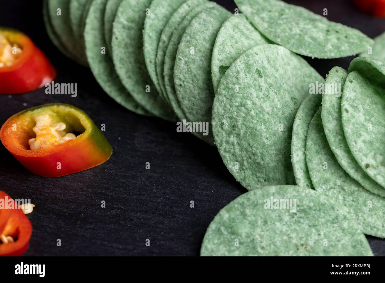 Thin and delicious green potato chips, crispy green chips with pepper ...