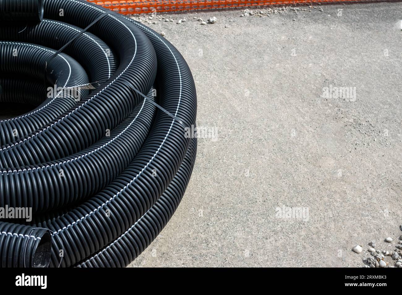 Long plastic tubes in works area for remodeling subsoil for electrical ...