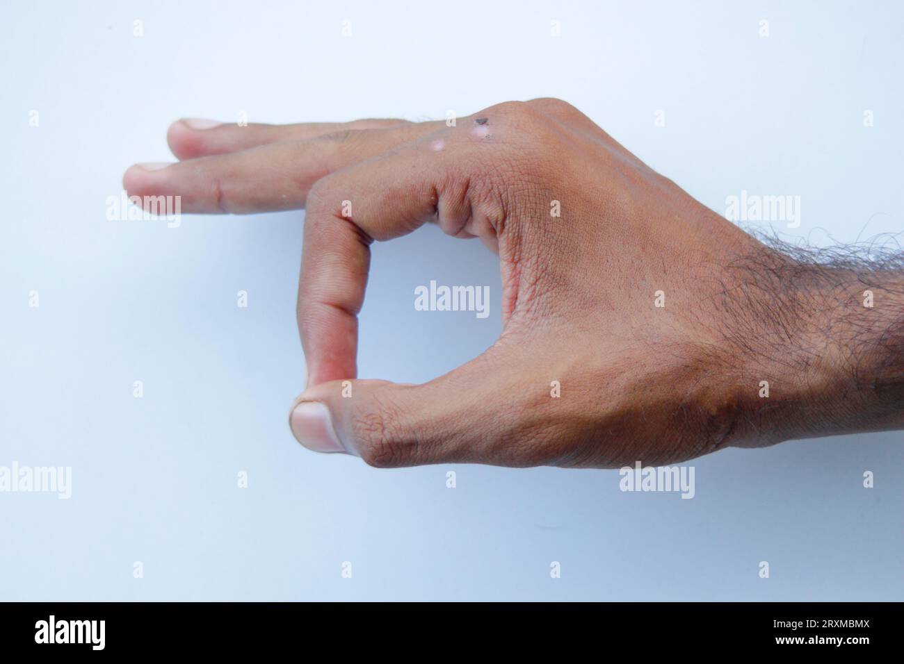 Men's Hand shows a hand sign of "OK", "all is well". Ok sign ...