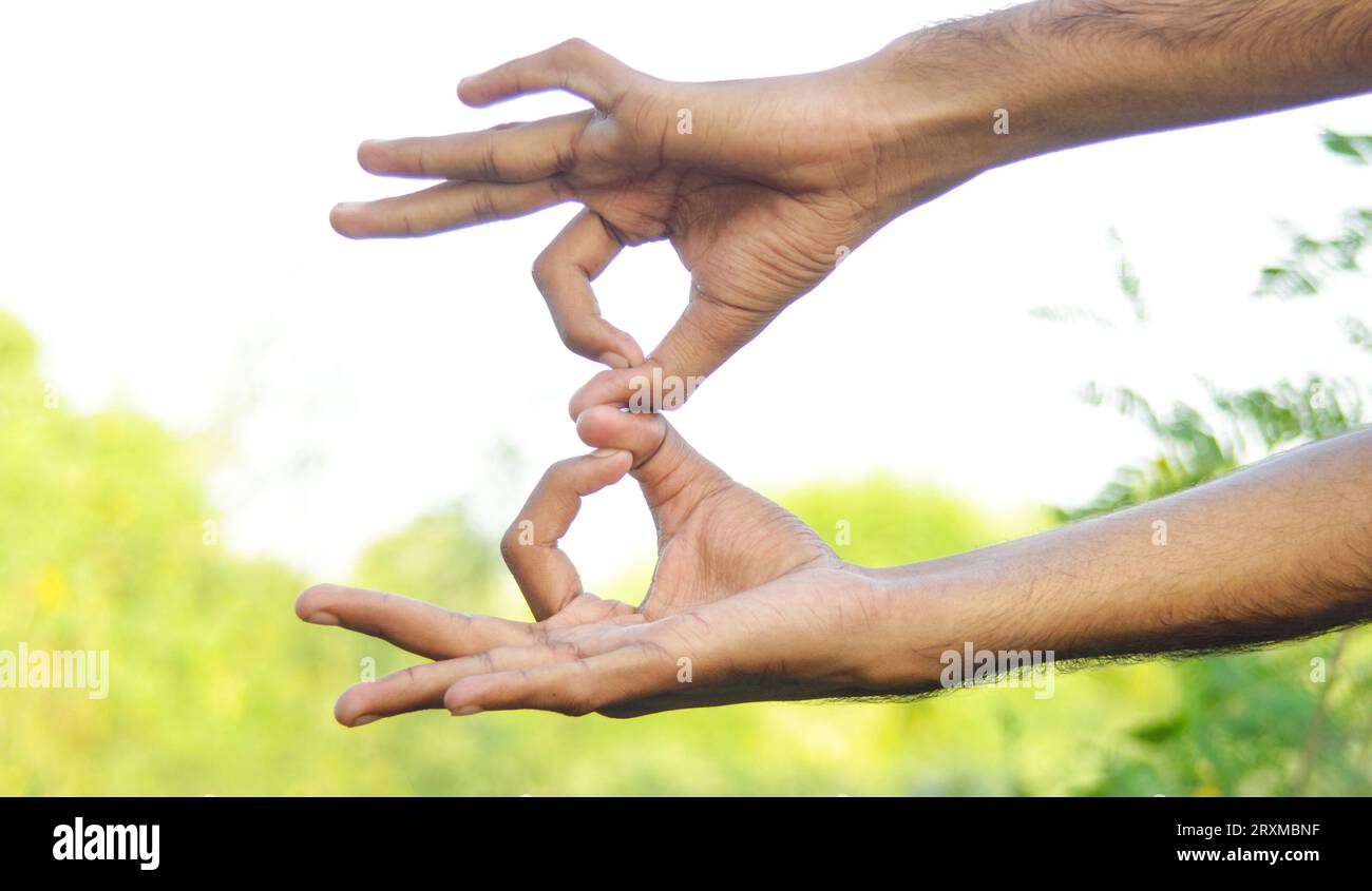 Men's Hand shows a hand sign of "OK", "all is well". Ok sign ...