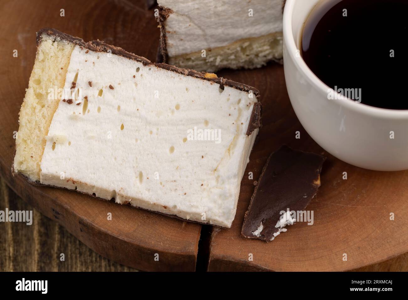 Fresh sweet cake with milk taste and aroma in chocolate glaze ...