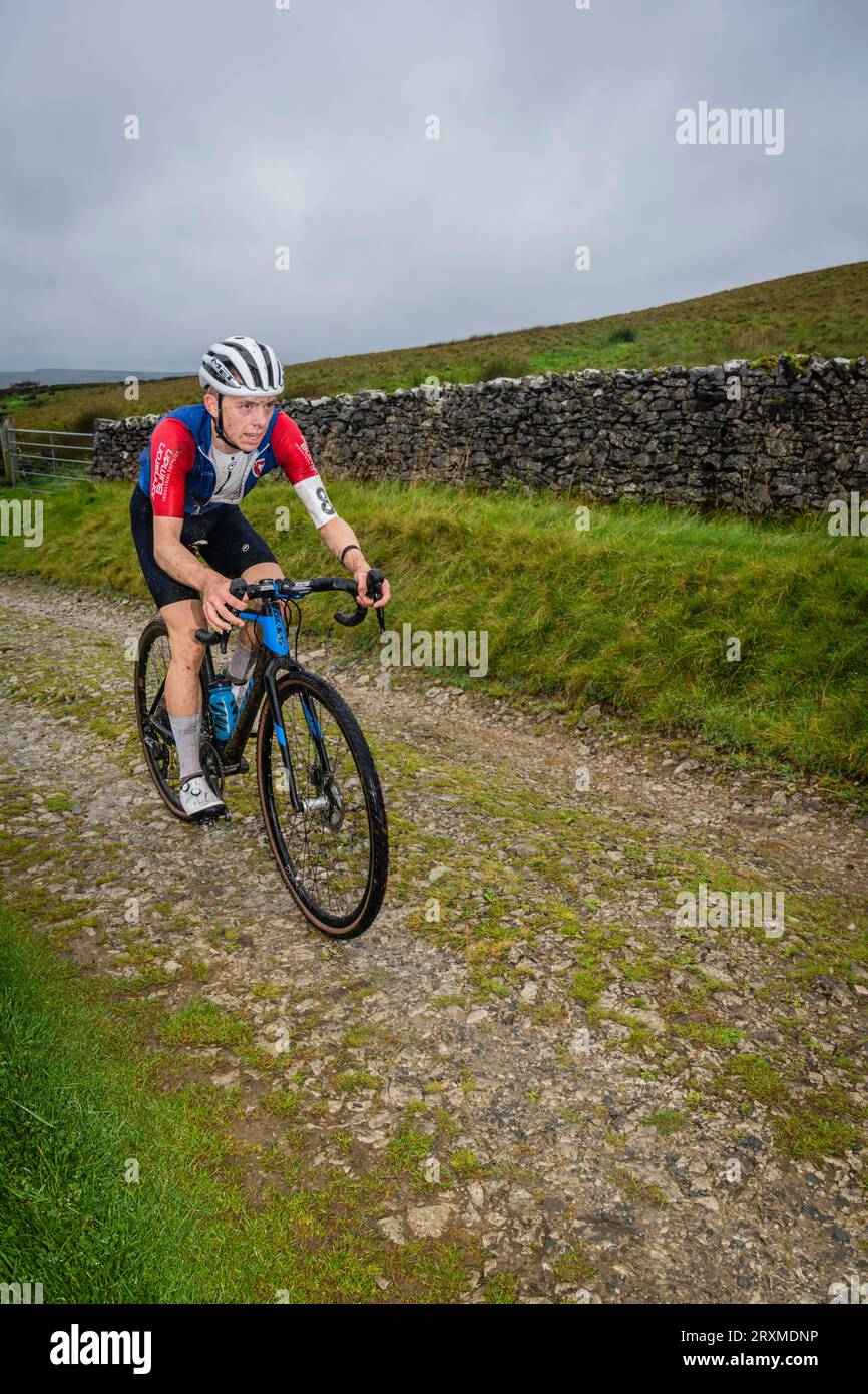 Competitor in the 2023 3 Peaks cyclocross race, Yorkshire Dales, UK ...