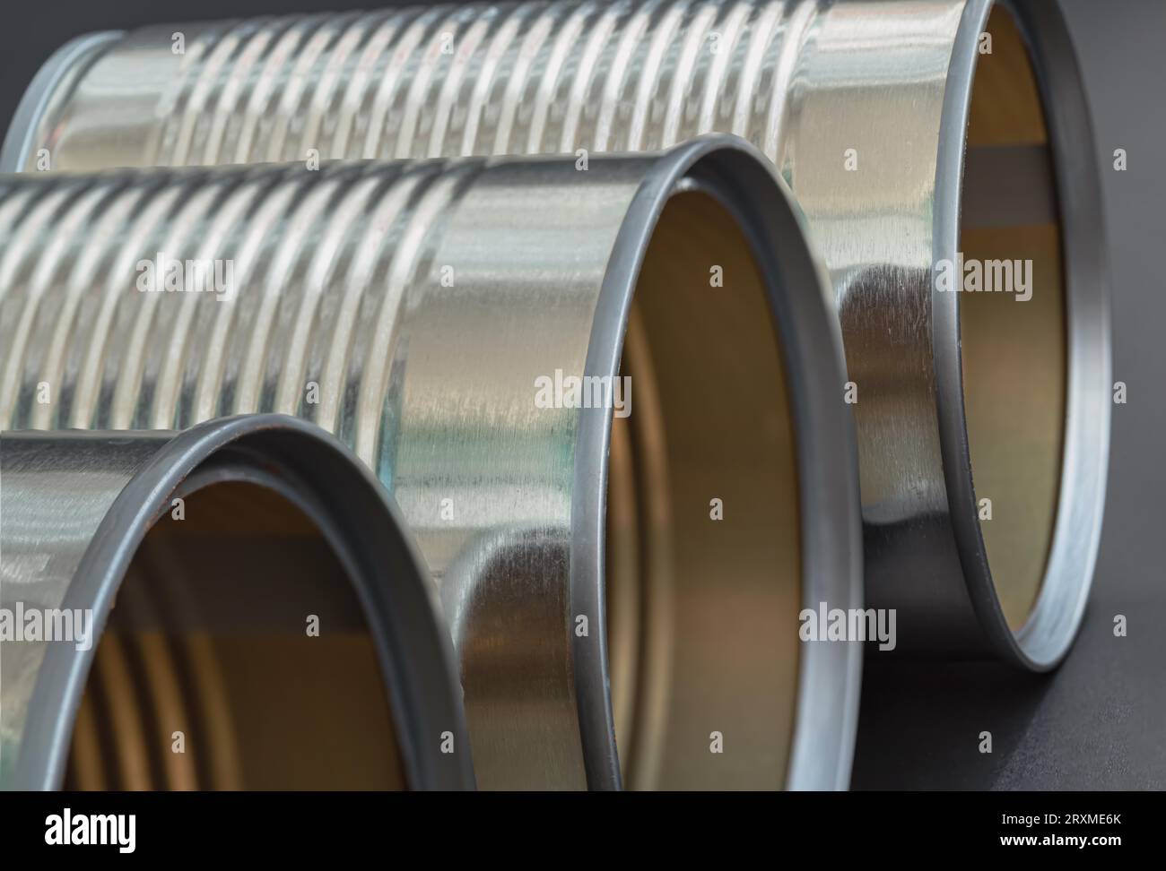 Three open empty opened Steel and tin cans arrange. Metal tin cans on ...