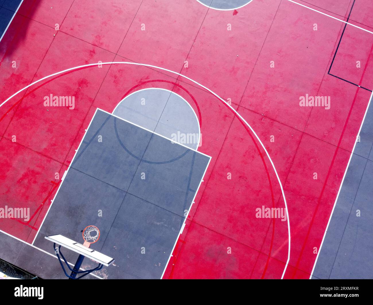 drone view of a basketball court painted red and gray Stock Photo - Alamy