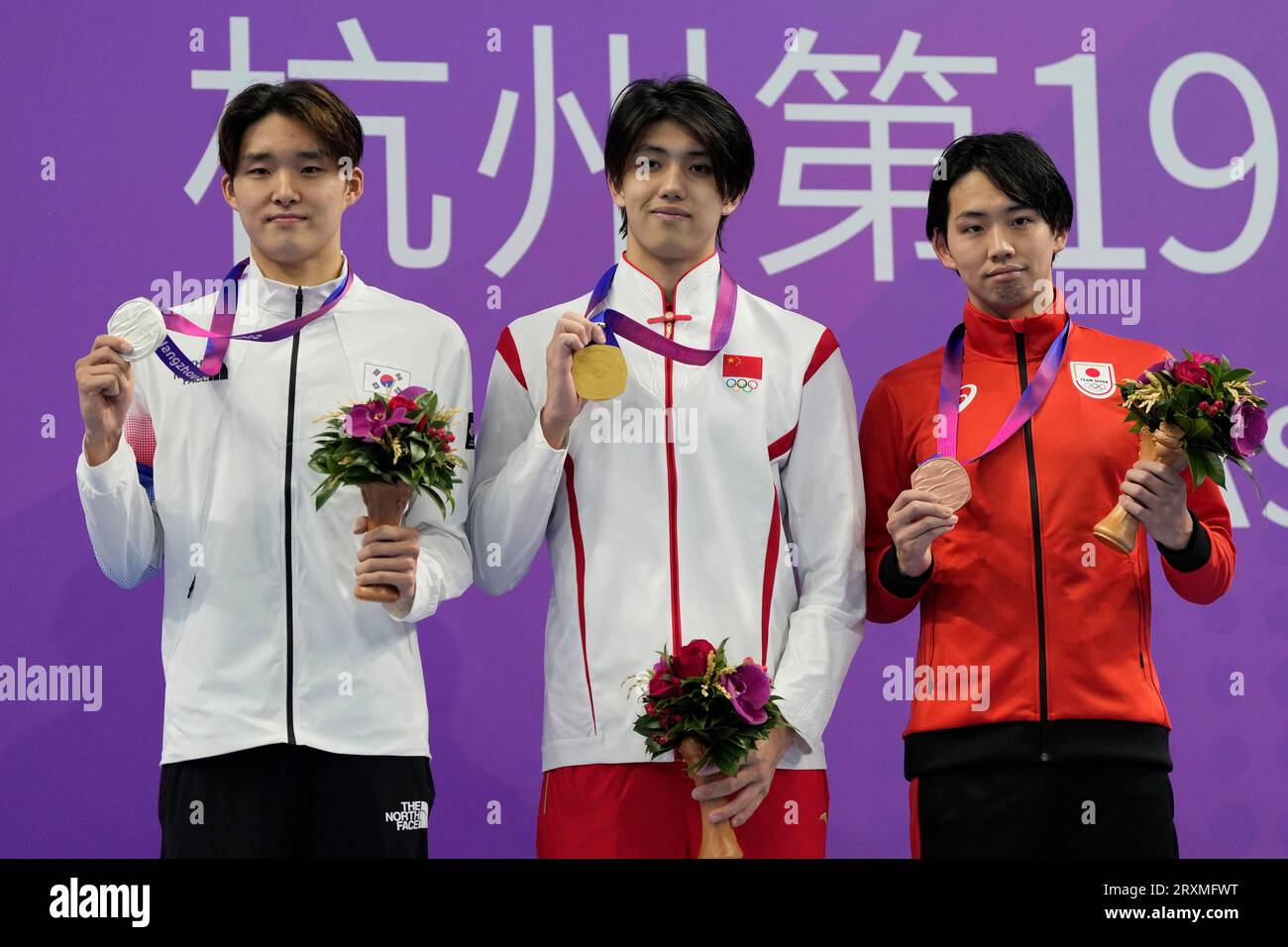 Medalists, from left to right, South Korea's Kim Woomin, silver, China ...