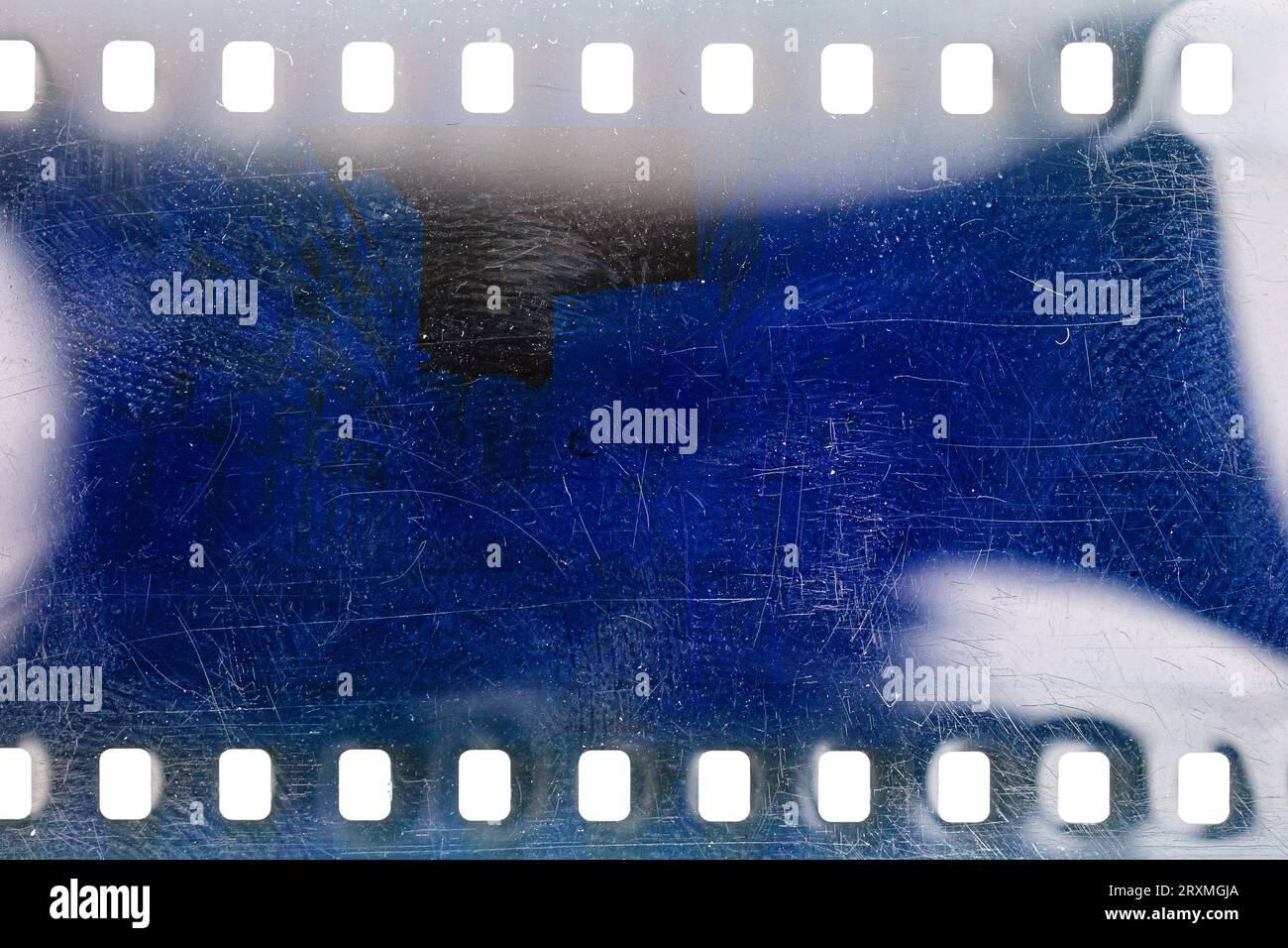 Dusty and grungy 35mm film texture or surface. Perforated scratched ...