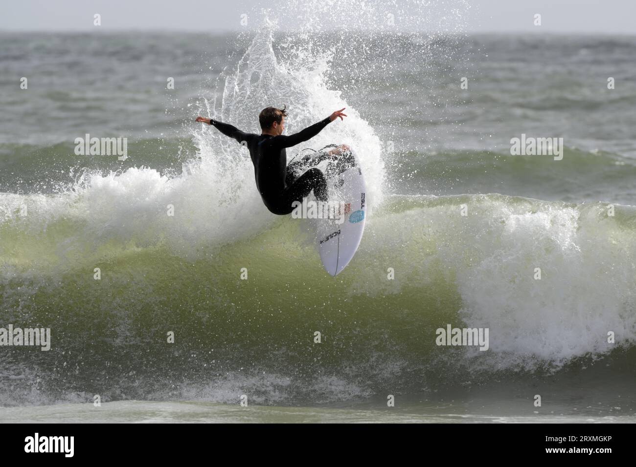 Patrick Langdon Dark surfing storm waves at Langland Bay Gower Wales ...