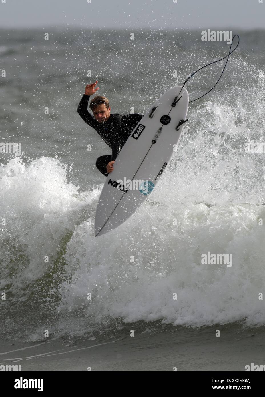 Patrick Langdon Dark surfing the storm at Langland Bay Gower Wales ...