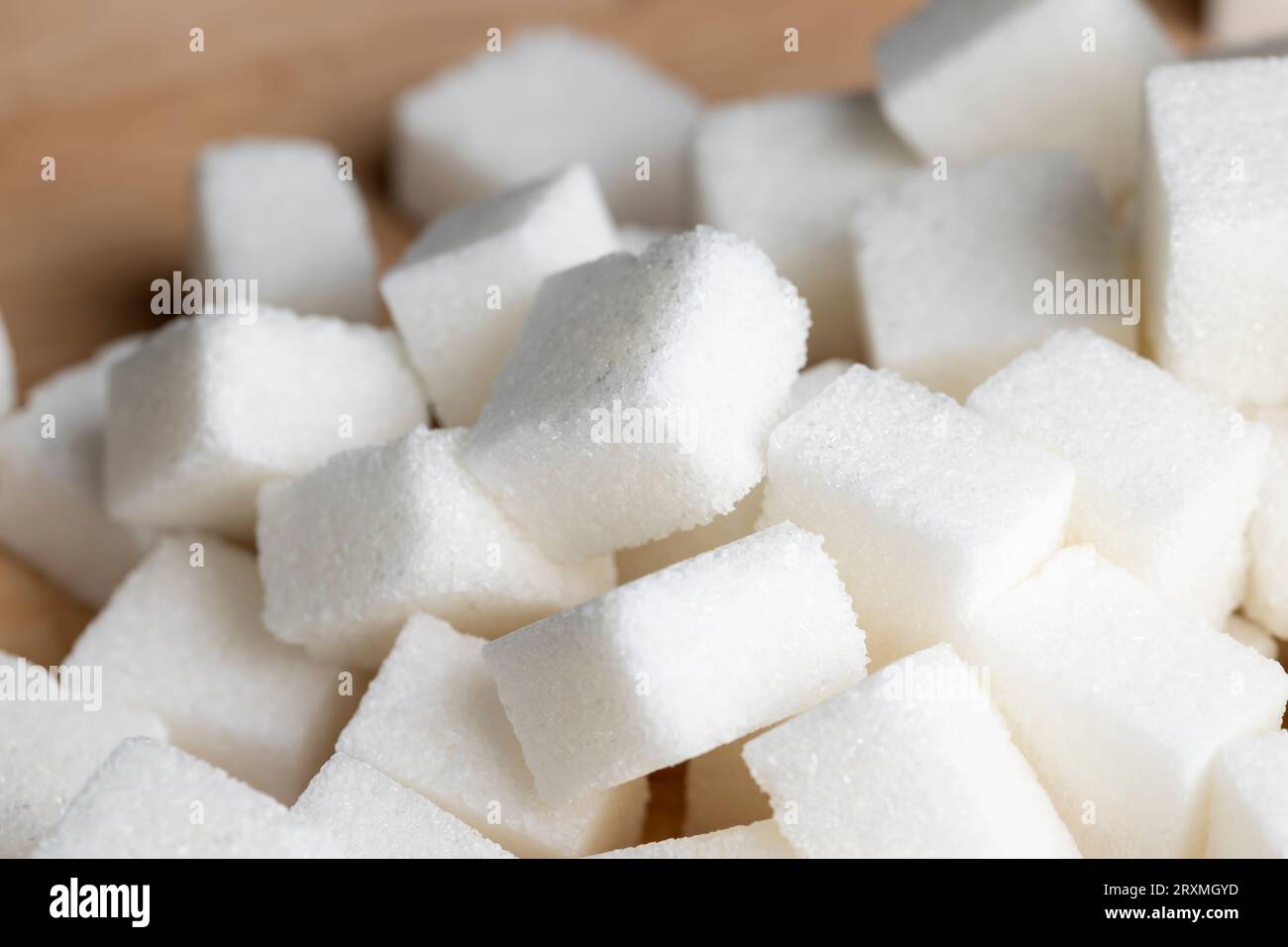 White sugar made from beetroot, cubes of white beet sugar close-up ...