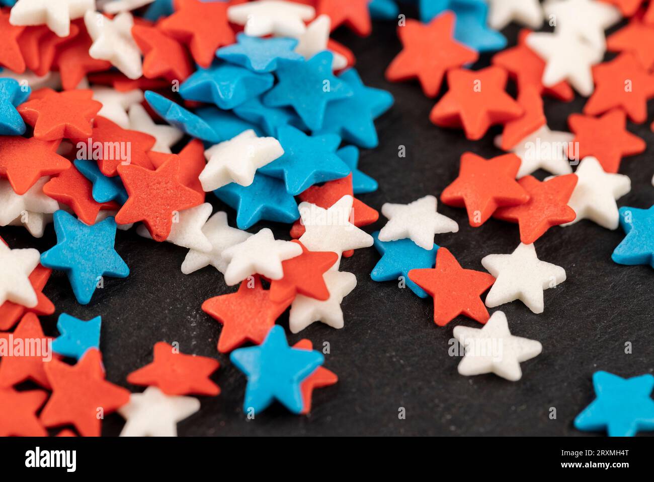 red, white and blue star-shaped candies for decorating cakes and other ...