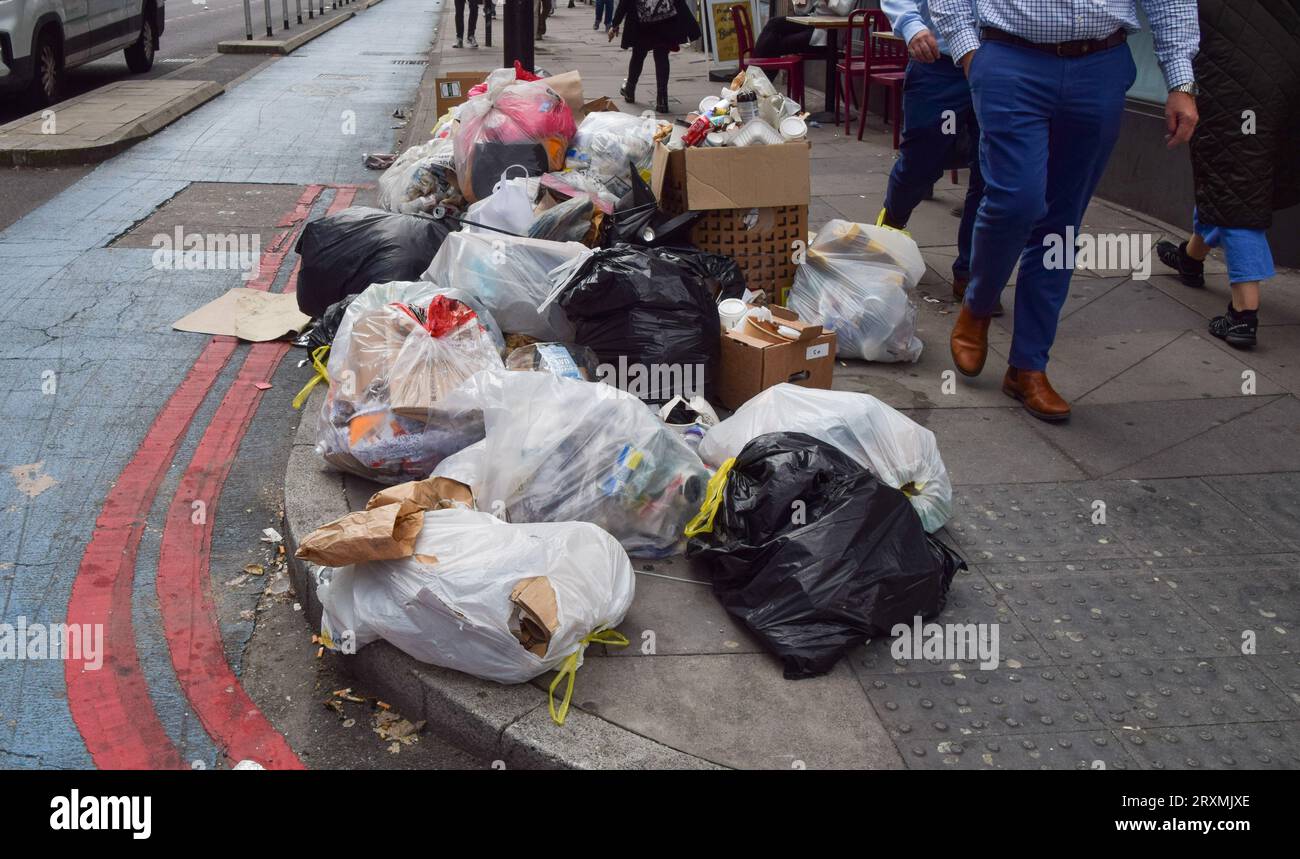 London, UK. 26th September 2023. Growing piles of garbage line the ...