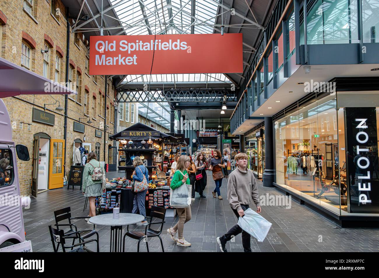 People walking through Old Spitalfields Market , London E1 Stock Photo ...