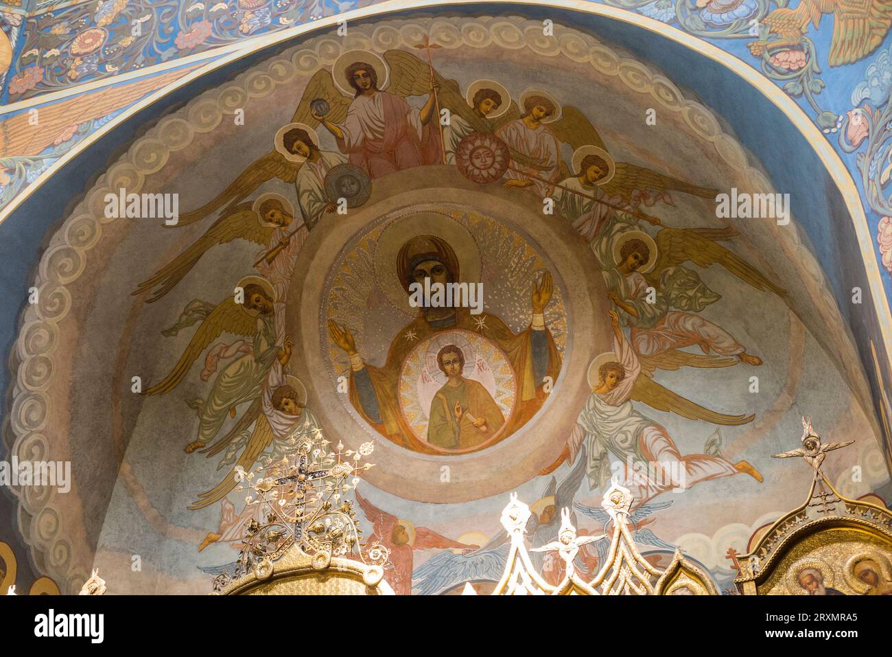 Looking up at images and paintings on the vaults of the altar apse at ...