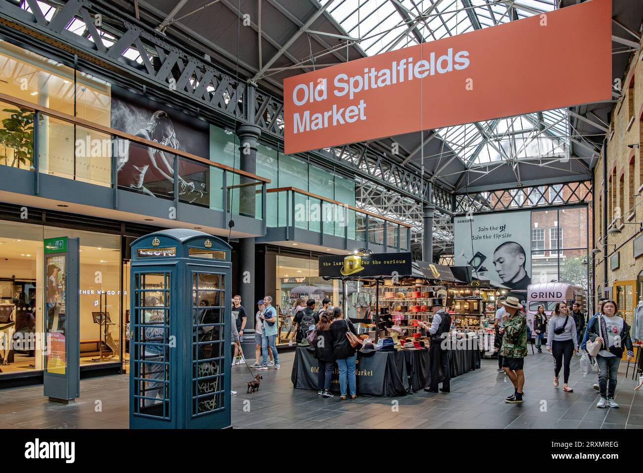 People walking through Old Spitalfields Market , London E1 Stock Photo ...