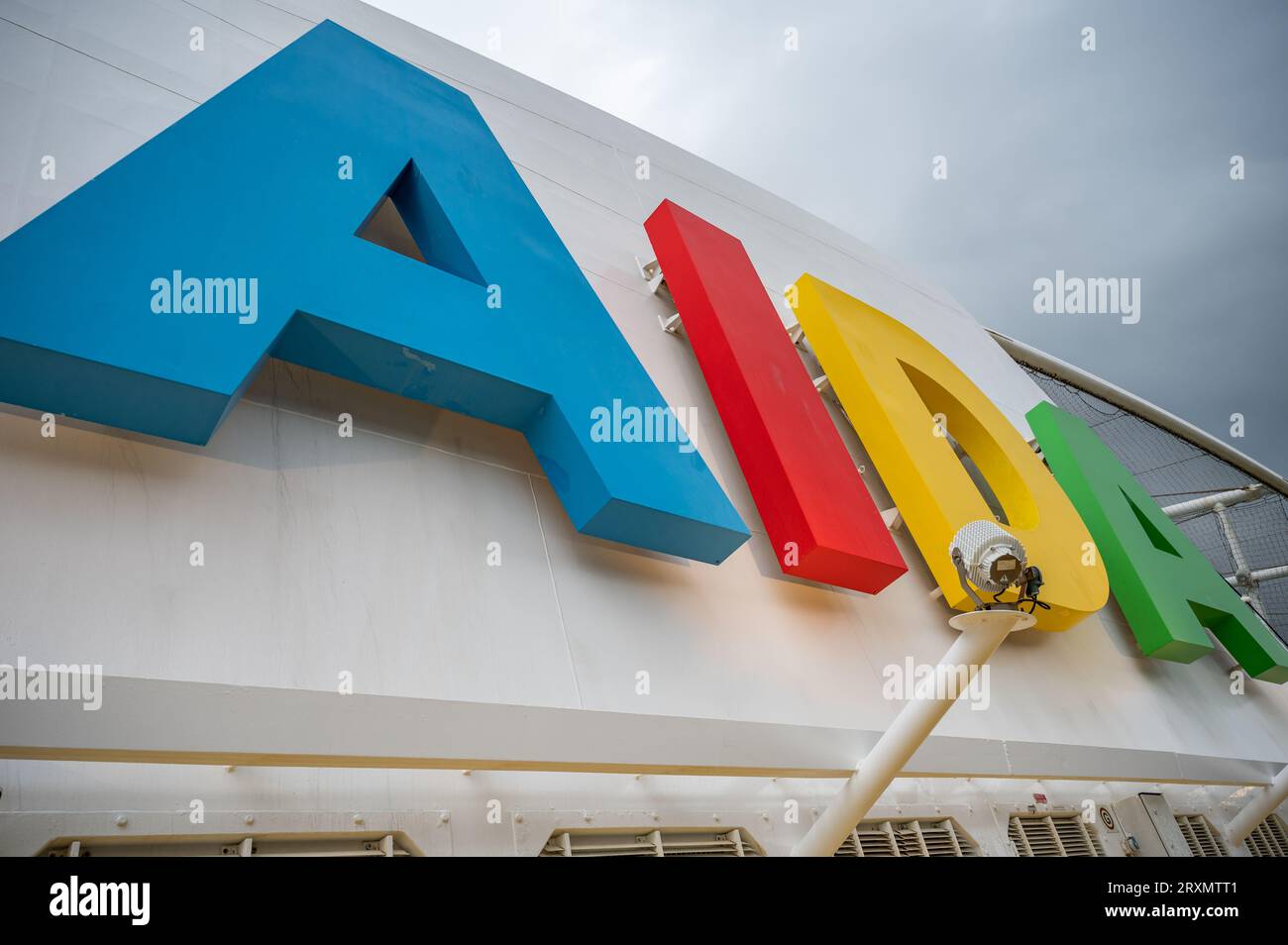 Colorful AIDA Logo attached to a AIDA Cruise ship during cloudy sky ...