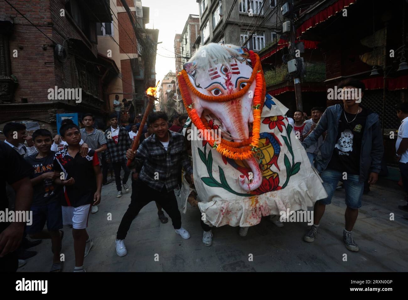 Kathmandu, Bagmati, Nepal. 26th Sep, 2023. An elephant-masked performer ...