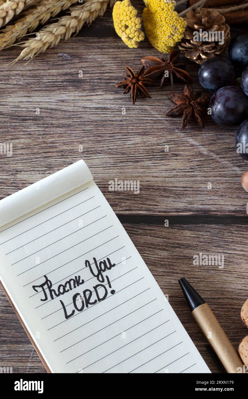 Thank You LORD, handwriting in notebook with wheat and autumn fruit on ...